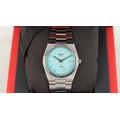 Brand: Tissot Model Name: Prx Reference: T137410A Movement: Quartz Box ...