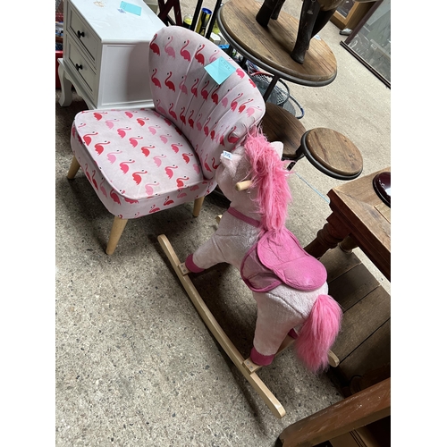 pink rocking horse & child’s pink chair