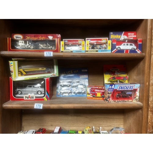 shelf of boxed vehicles