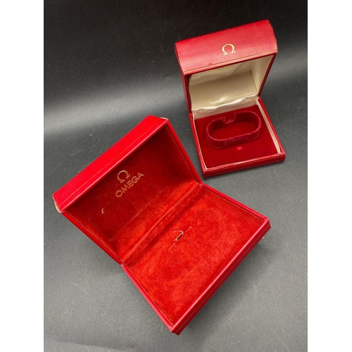 Two OMEGA wrist watch boxes one with fittings