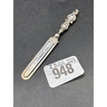 A silver bookmark in the form of a cricket bat, 3.5" long, Birmingham ...