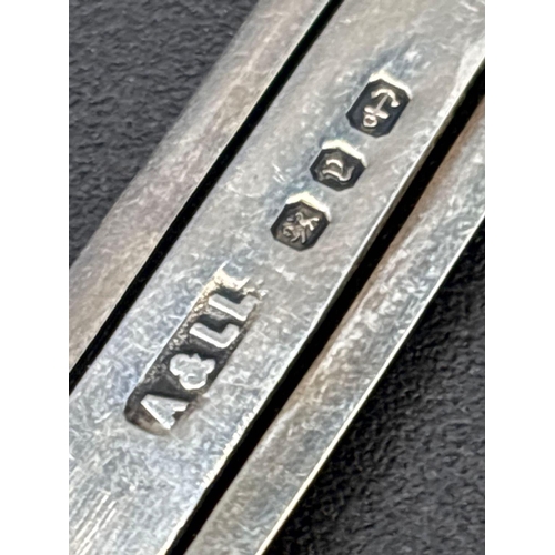 A silver bookmark in the form of a cricket bat, 3.5" long, Birmingham ...