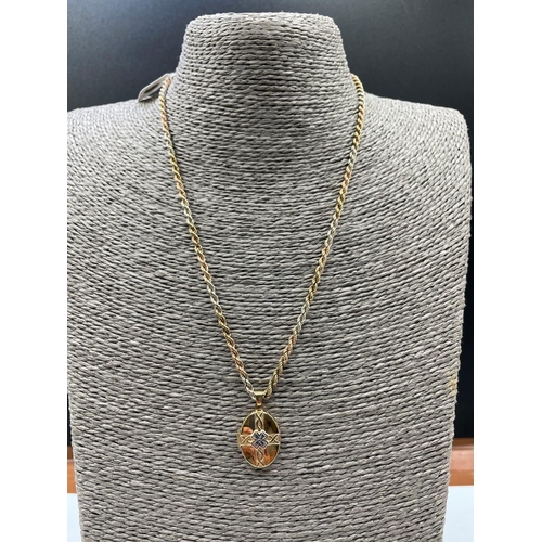 A two colour gold oval Best Friend Pendant locket on twist neck chain ...