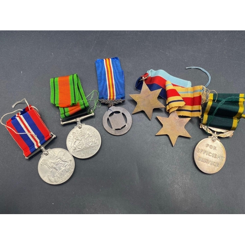 A George VI Efficient Service Medal to Lt DA Thomas RA, two WWII Stars ...