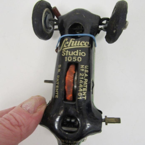 Schuco Studio 1050 tinplate clockwork racing car together with Paya ...