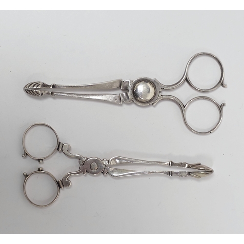Two sets of Georgian silver scissor action sugar nips, each marked with ...