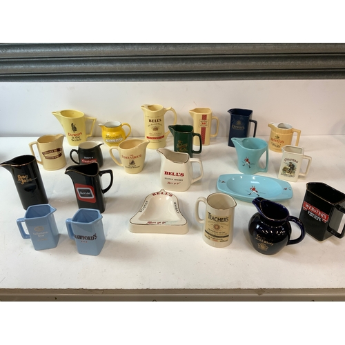 Large Collection of Whisky Jugs