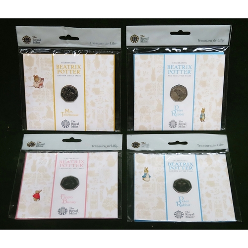 Set of four unopened Royal Mint Beatrix Potter 50p coins