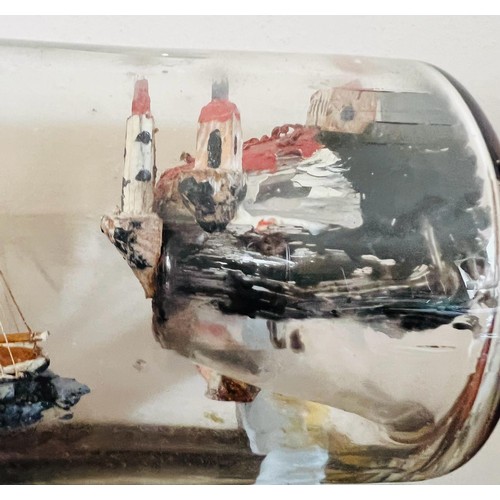 SHIP IN A BOTTLE DIORAMA ON STAND, PENNANT BEARING NAME "INNIE"