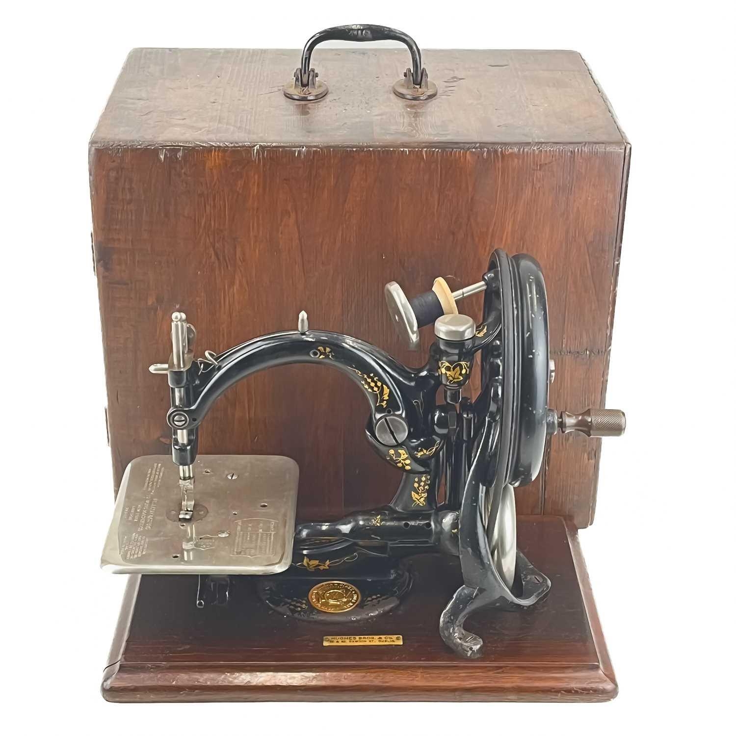 A Wilcox and Gibbs Automatic Silent Sewing Machine. With retailers ...