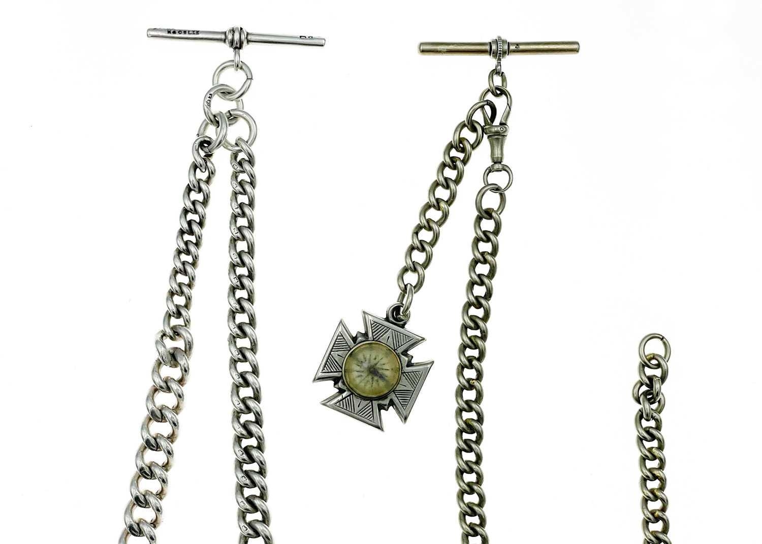 Two silver Albert pocket watch chains. One is a heavy double graduated ...