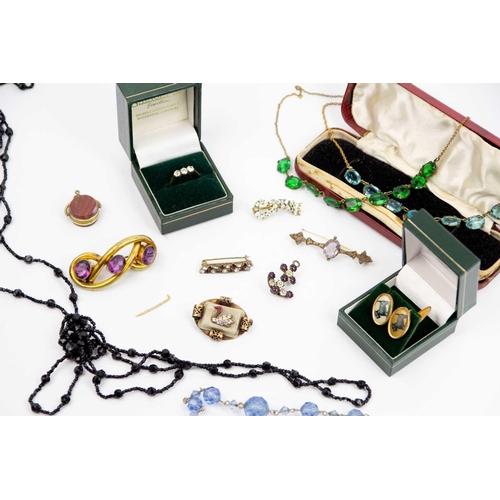A collection of antique gold plated costume jewels. To include two ...