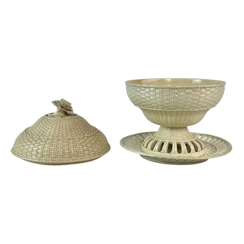 An 18th century creamware chestnut bowl and cover with stand. The lift ...