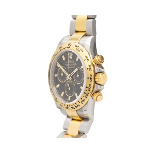 ROLEX - A fine Cosmograph Daytona 18k and steel gentleman's wristwatch ...