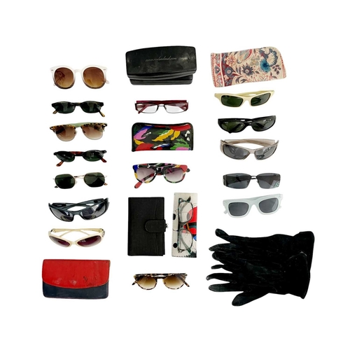 An assortment of sunglasses and purses. Including 'VERACE' sunglasses ...