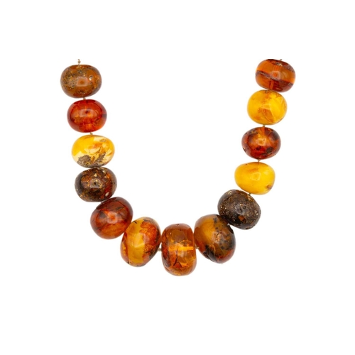 An impressive, large amber bead necklace. Each bead is unique, of a ...