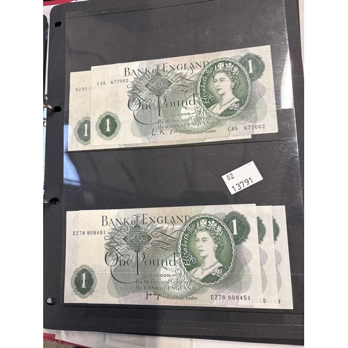 Collection of mostly Great Britain banknotes. A red folder containing ...