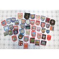 A Quantity Of Woven Cloth Emblem Badges