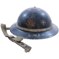 An LNER Air Raid Patrol helmet, with white band, LNER initials on the ...