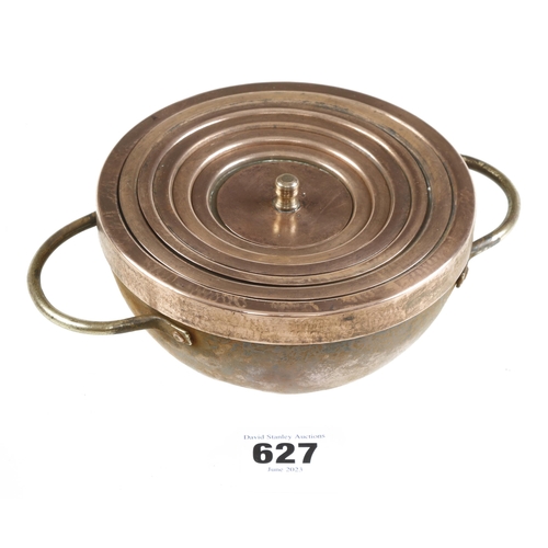 An early copper water bath with set of rings to take different crucible ...