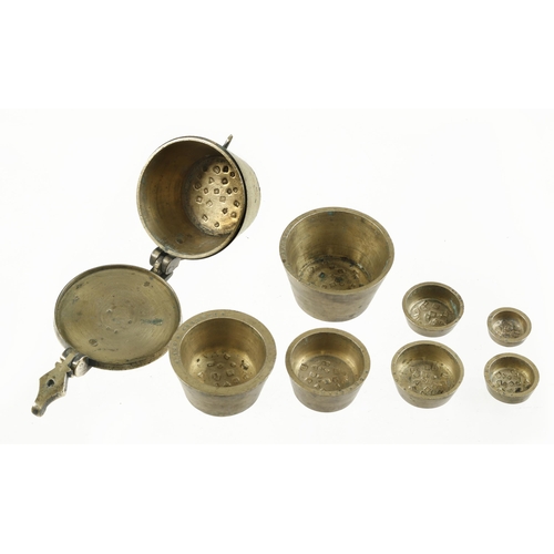 A set of brass cup weights 5-100 grams with numerous W & M stamps G+