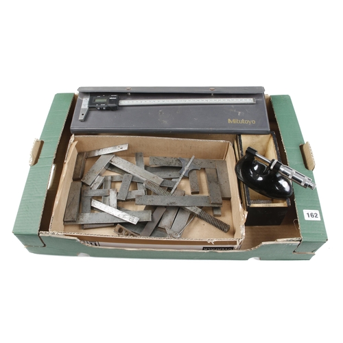 An engineer's bench micrometer by ZIESS a caliper gauge by M.ITUTOYO ...