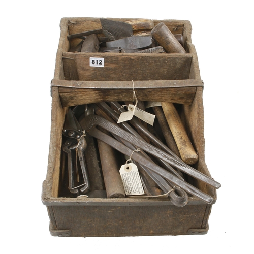 A farriers toolbox with numerous tools G