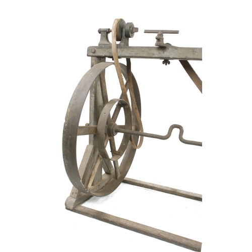 A primitive lathe on oak frame with large pulley wheel, would have ...