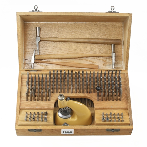 A probably unused comprehensive watchmaker's staking set in orig fitted ...