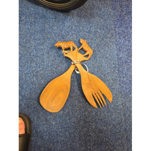 A Pair of Hand Carved African Wooden Cheetah/Leopard Salad Servers