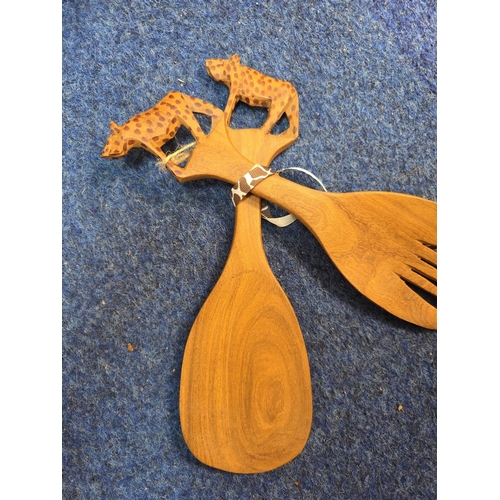 A Pair of Hand Carved African Wooden Cheetah/Leopard Salad Servers