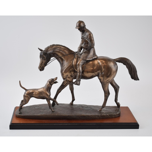 David Geenty: a bronzed resin huntsman scene on wooden base, 38cm wide.