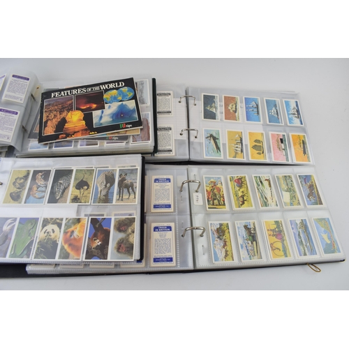 A collection of folders containing complete albums of Brook Bond and PG ...