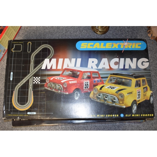 A boxed Scalextric 'Mini Racing' set complete with cars.
