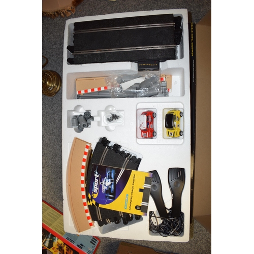 A boxed Scalextric 'Mini Racing' set complete with cars.