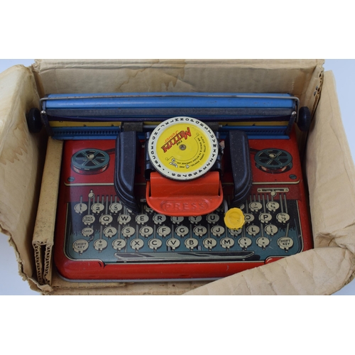 A boxed 'Mettype' tin toy typewriter