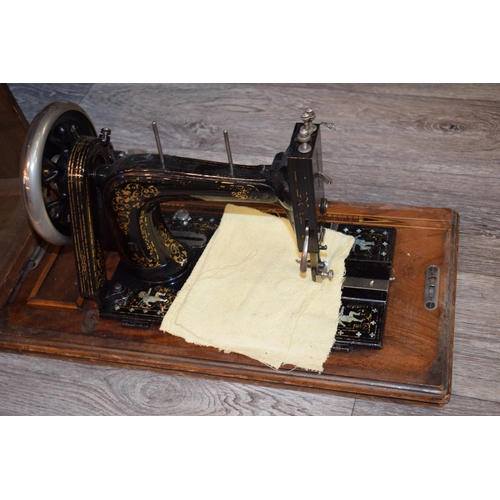 Cased Simplex hand driven sewing machine inlaid mother of pearl ...