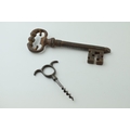 A vintage novelty 'Corkscrew Key'. Key head unscrews to reveal a ...