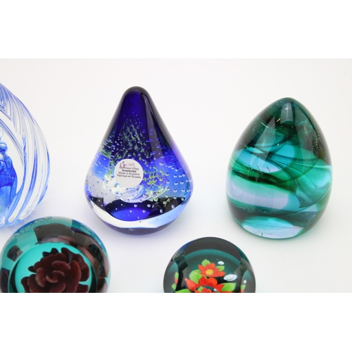 A collection of glass paperweights to include Caithness purple pyramid ...
