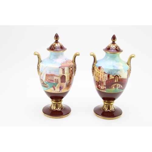Two Caverswall twin handled lidded vases decorated in the Rialto bridge ...