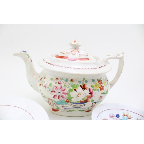 A Hilditch teapot with issues, with a dish, 21cm diameter, with three ...