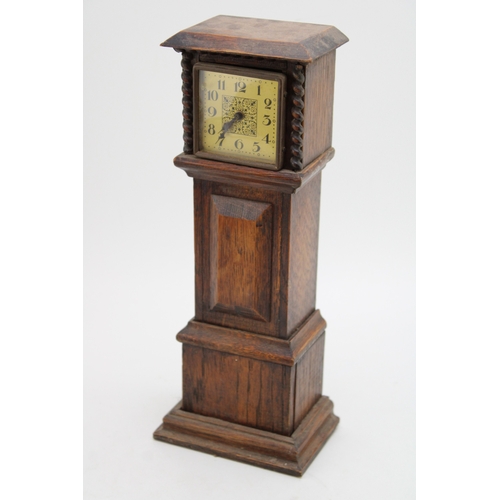 An early to mid 20th century miniature longcase clock with movement ...