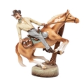 A prototype Beswick figure of an American Cowboy on horseback, modelled ...