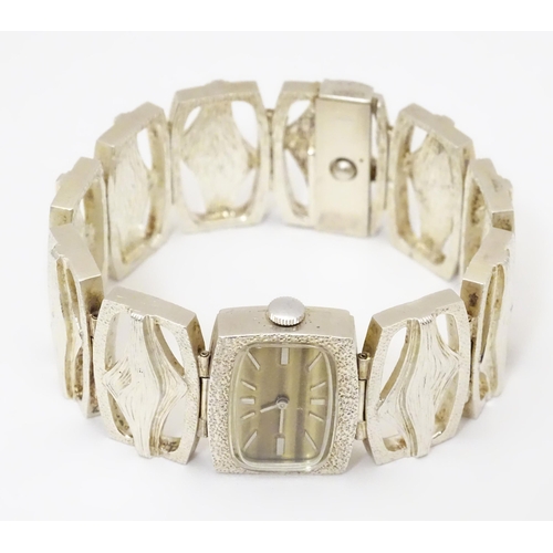 A mid - century modernist watch by David Shackman and Sons