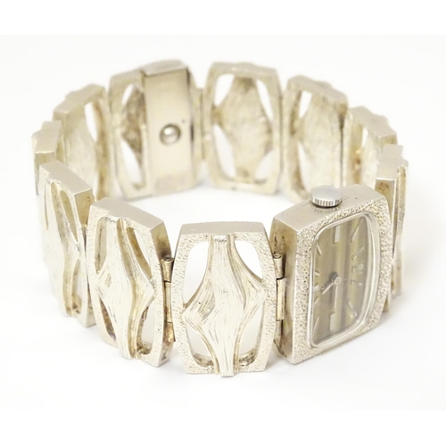 A mid - century modernist watch by David Shackman and Sons