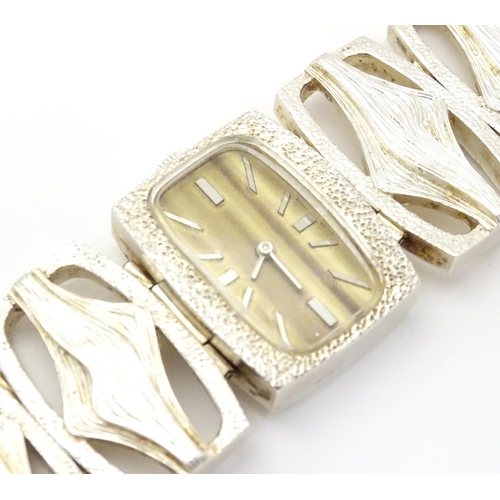 A mid - century modernist watch by David Shackman and Sons