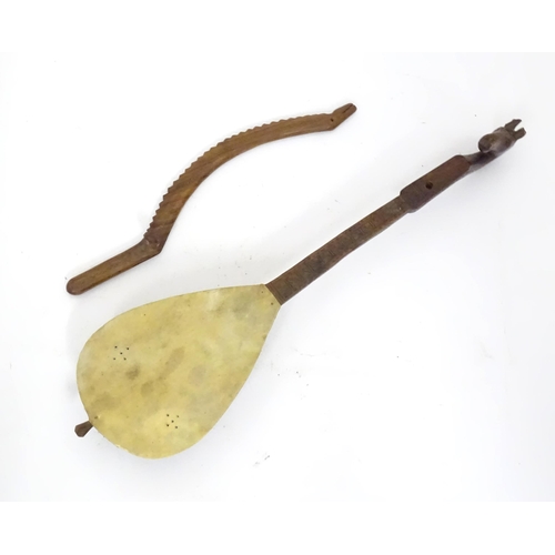 Musical Instrument: a 20thC Gusle fiddle, the bowl back and neck ...