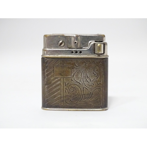 A mid 20thC Ronson Standard pocket lighter with original box and slip ...