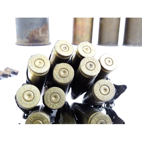 Militaria: a quantity of inert shell cases, comprising a WWII French ...