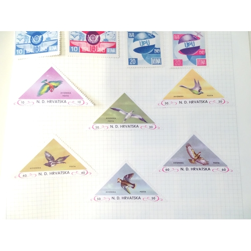 A quantity of 19th and 20thC postage stamps affixed within five albums ...